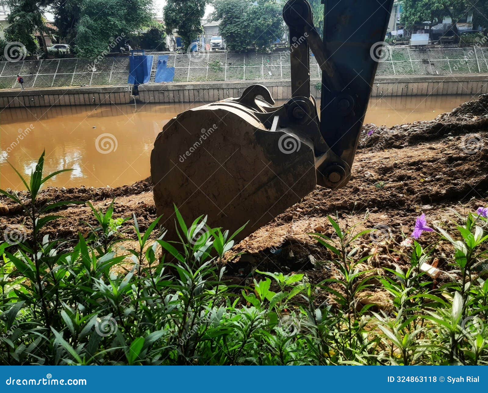 Excavator Bucket Lifting Mud from the River Stock Photo - Image of ...
