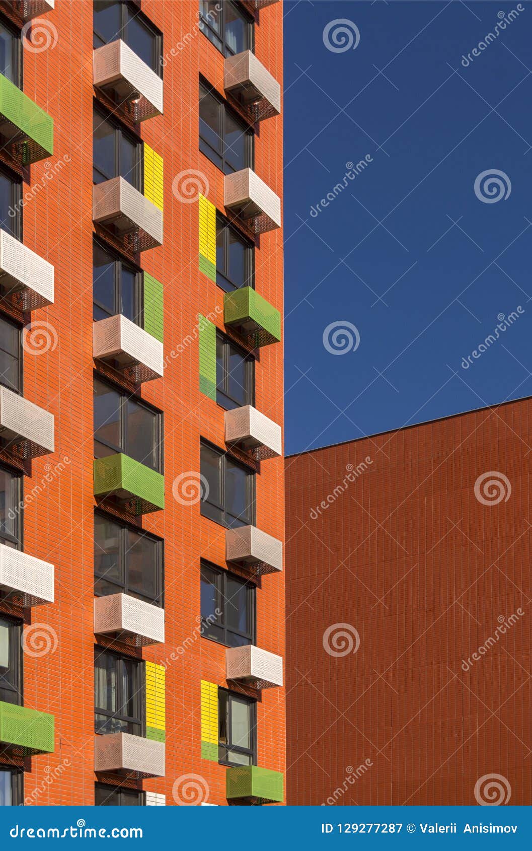 View of the Facade of an Orange Multi-storey Residential Building ...