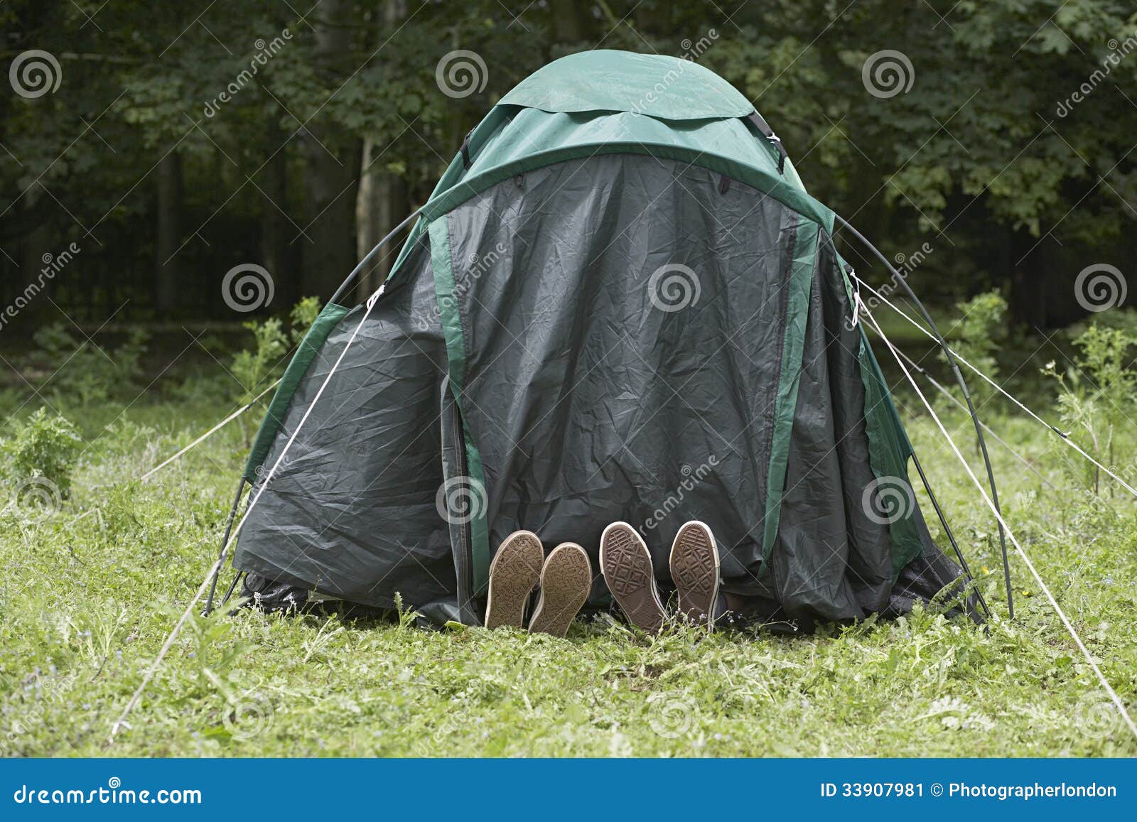 View of Feet in Tent stock image. Image of ecotourism - 33907981