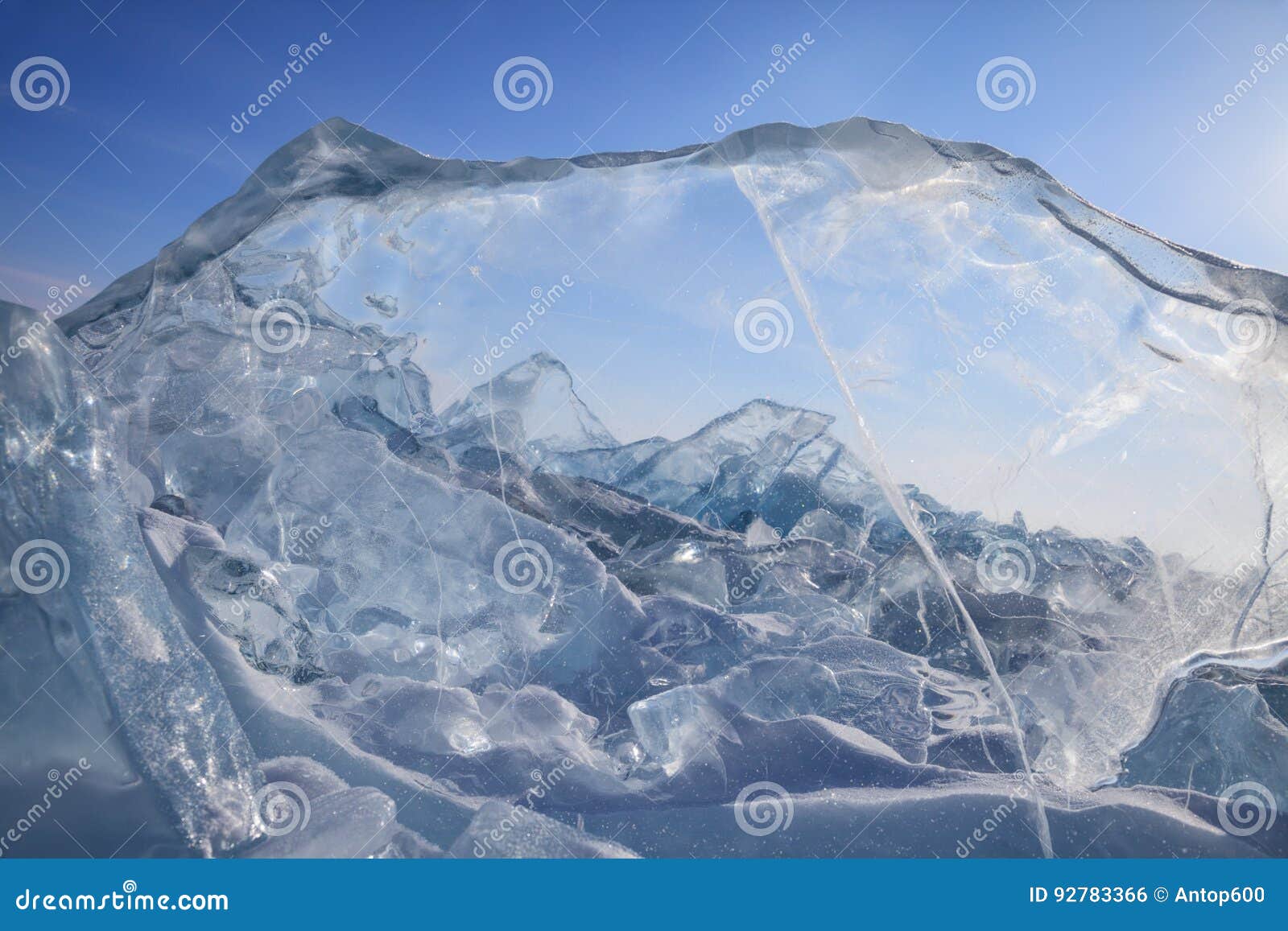 View on Field of Blue Broken Ice through the Transparent Ice Block ...