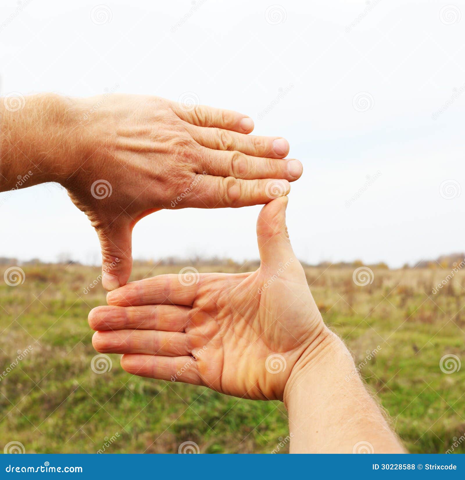 View at Country Field through Hand Frame Stock Photo - Image of land ...