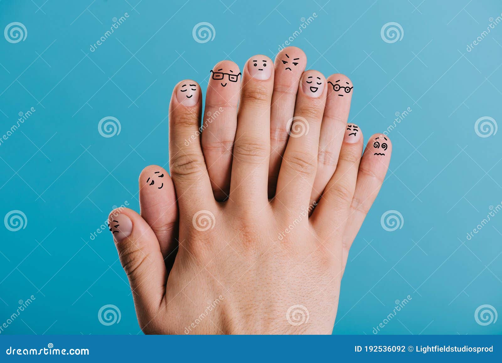 View of Fingers with Different Emotions Isolated on Blue Stock Photo ...