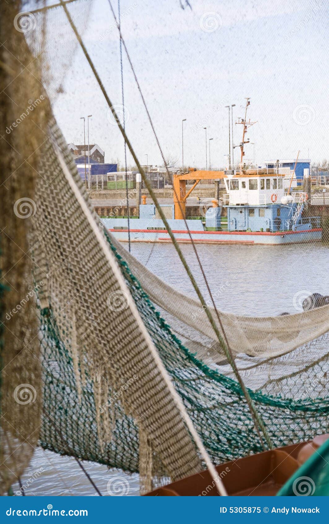 View through fishing nets stock image. Image of mode, industry - 5305875