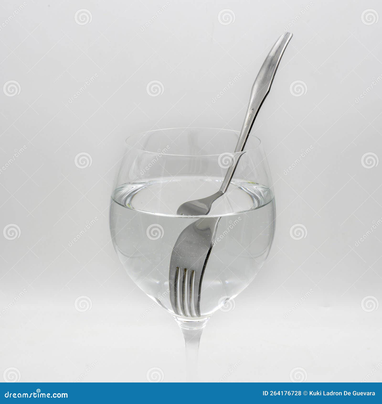 View of a Fork Inside a Glass Filled with Water Stock Photo - Image of ...