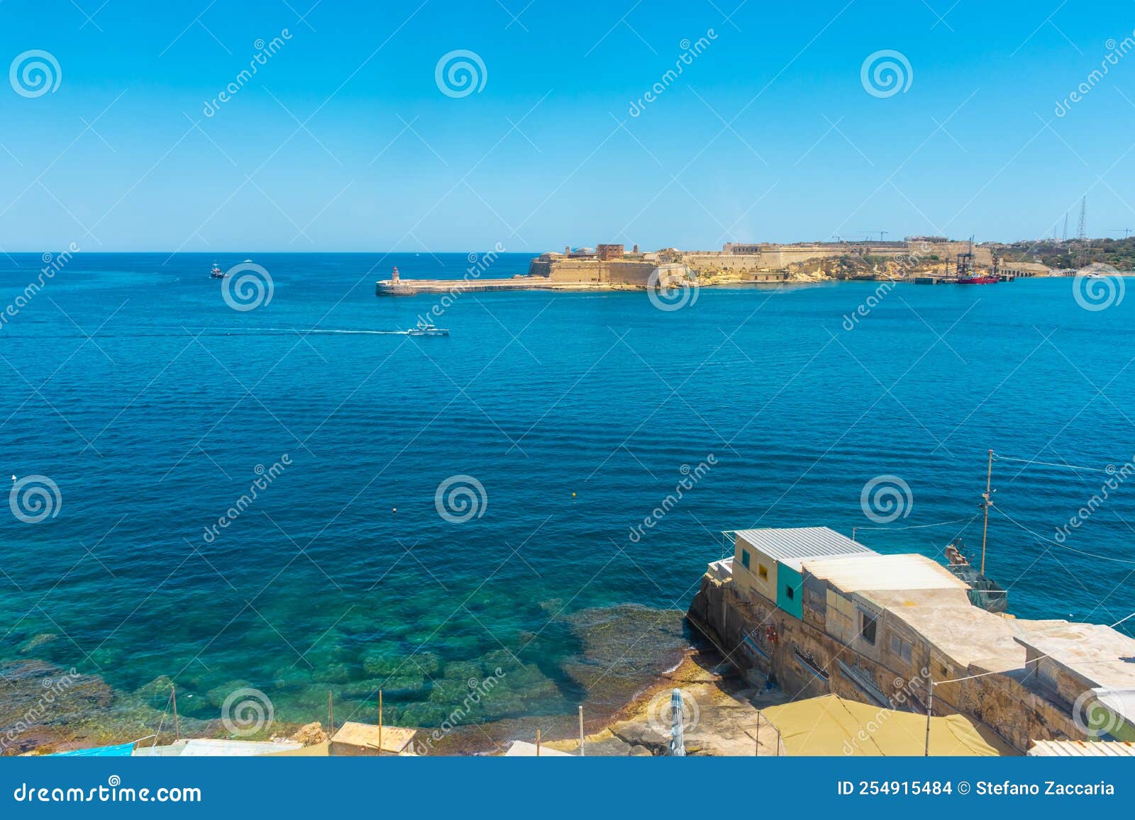 View of Fort Ricasoli from Valletta, Malta Stock Photo - Image of city ...