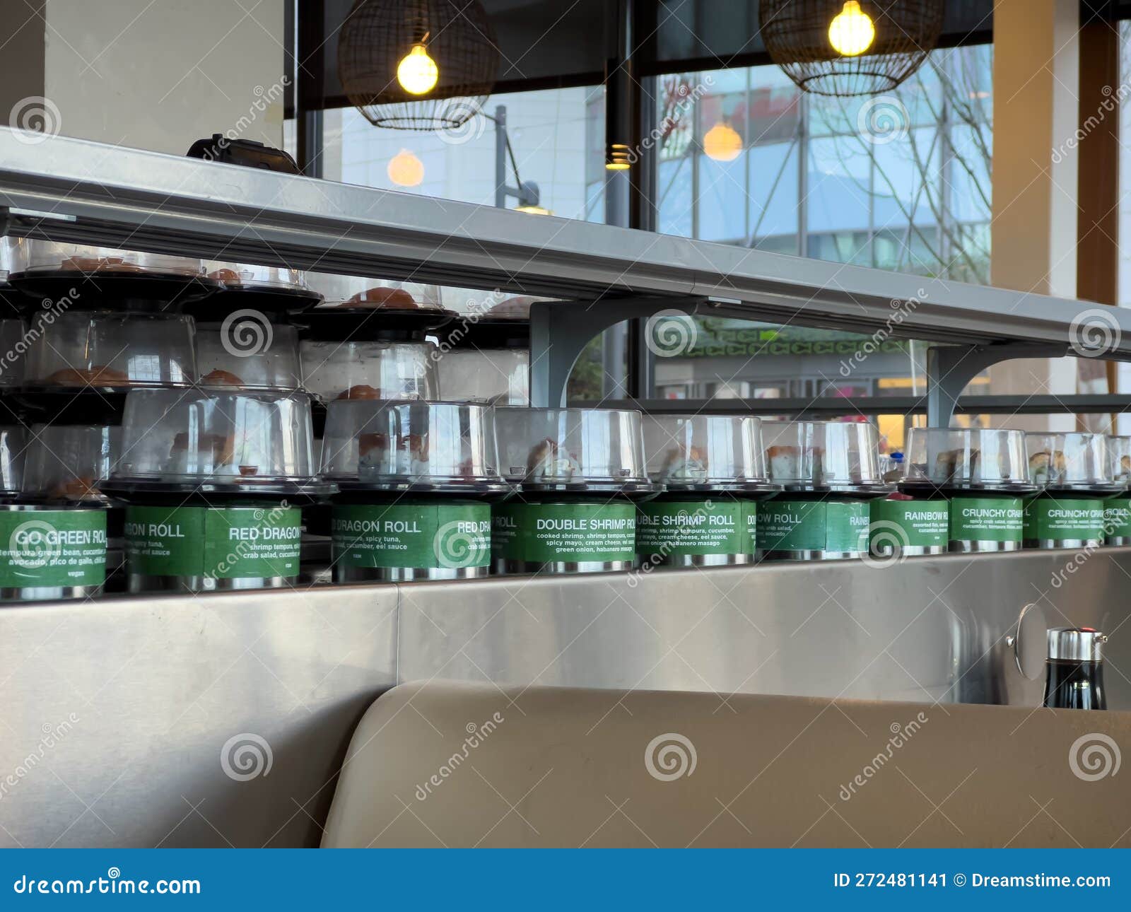 View of Freshly Made Sushi on a Conveyor Belt Inside a Sushi Train ...