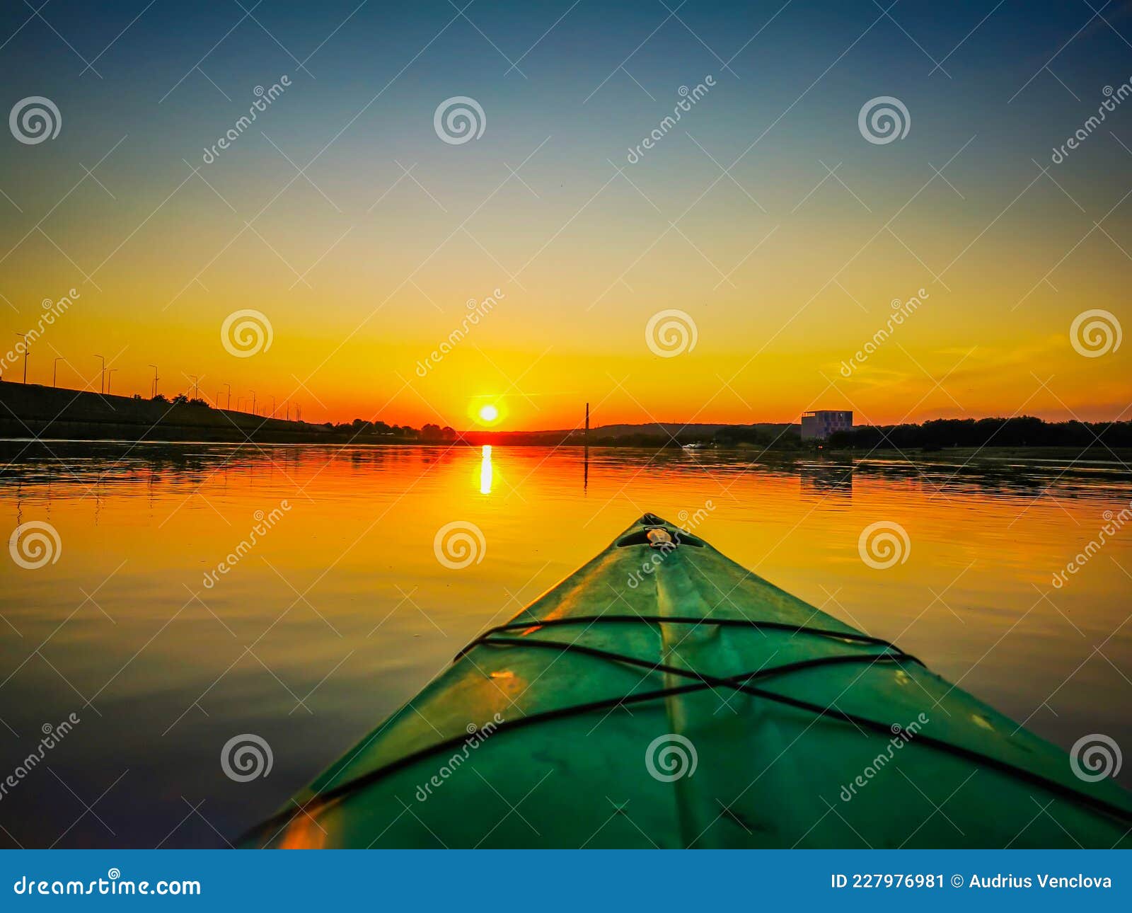 View of Front of Kayak, Floating on the River at Sunset Stock Image ...