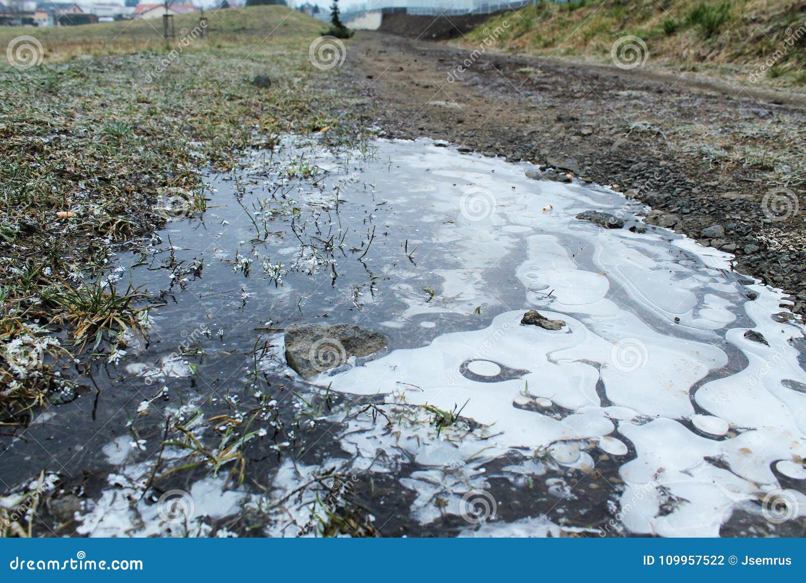 A frozen puddle stock photo. Image of travel, rock, natural - 109957522