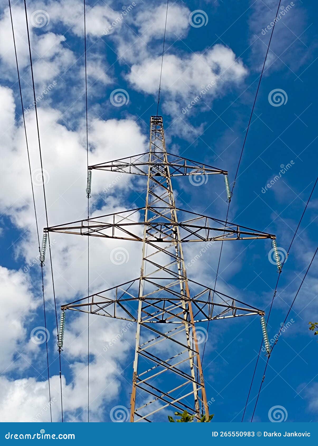 View of Giant Power Tower with High Voltage Power Cables Against Clear ...