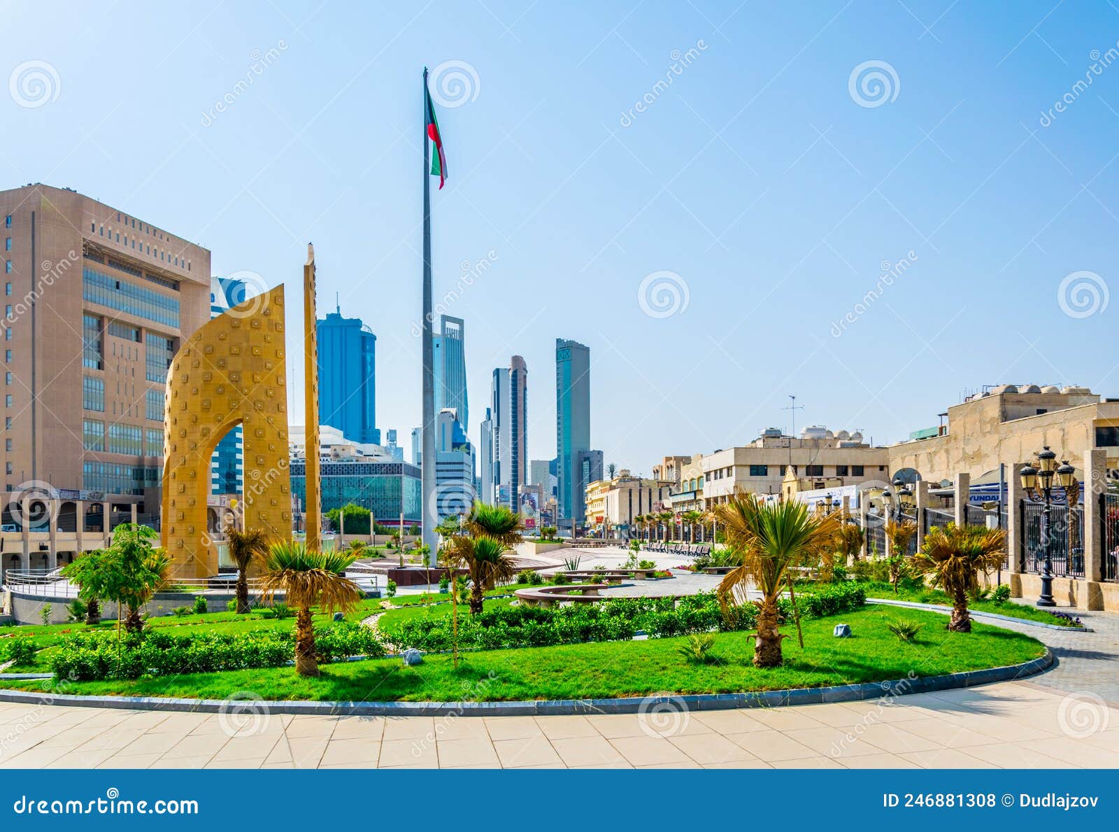 View of a a Golden Monument with a Small Park in the Central Kuwait ...