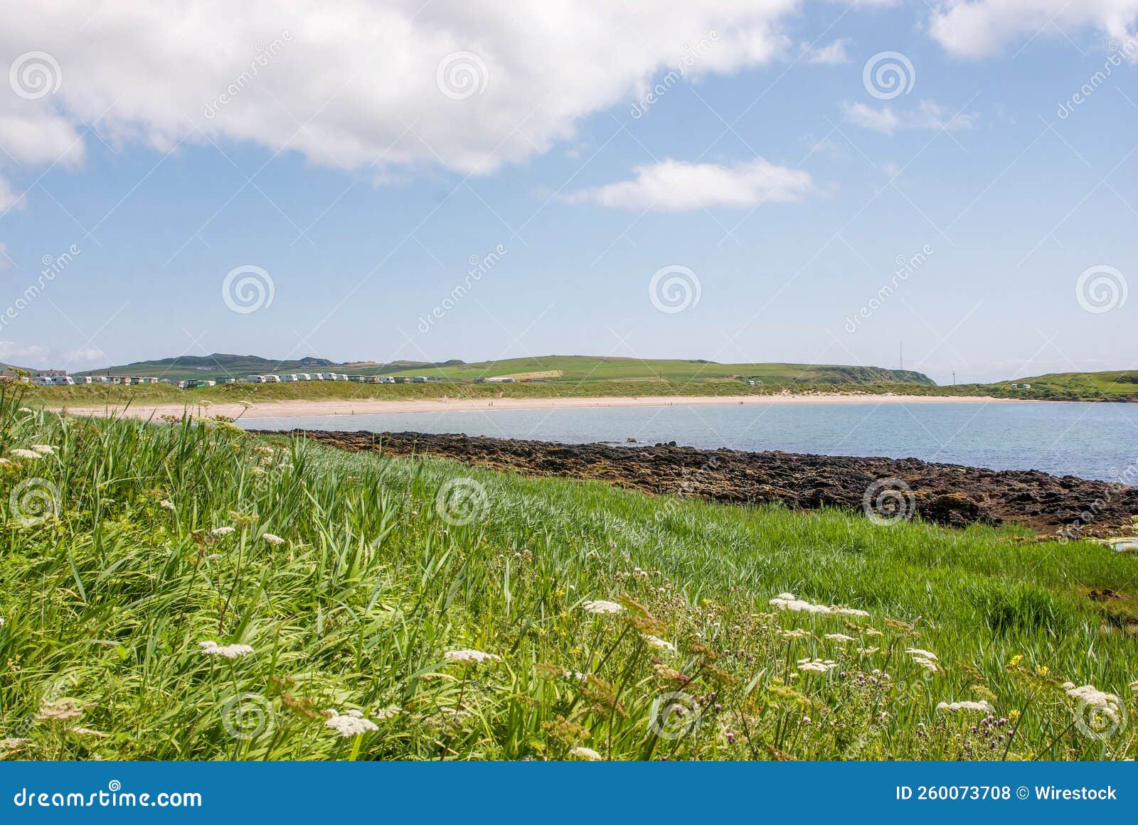 View of Grass Fields on the Banks of Dunaverty Bay Under the Blue Sky ...