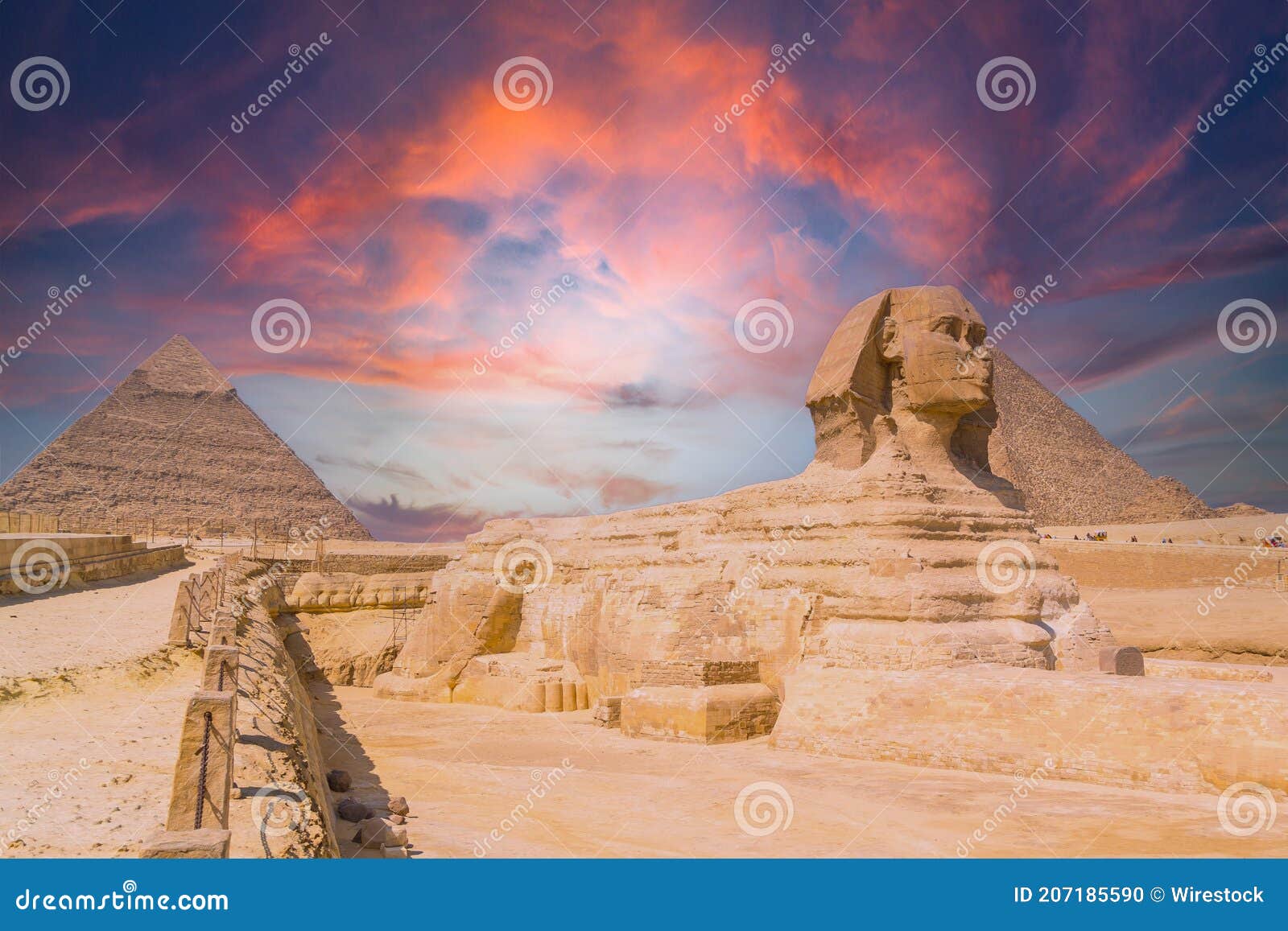 View of the the Great Sphinx and the Pyramids of Giza Against a ...