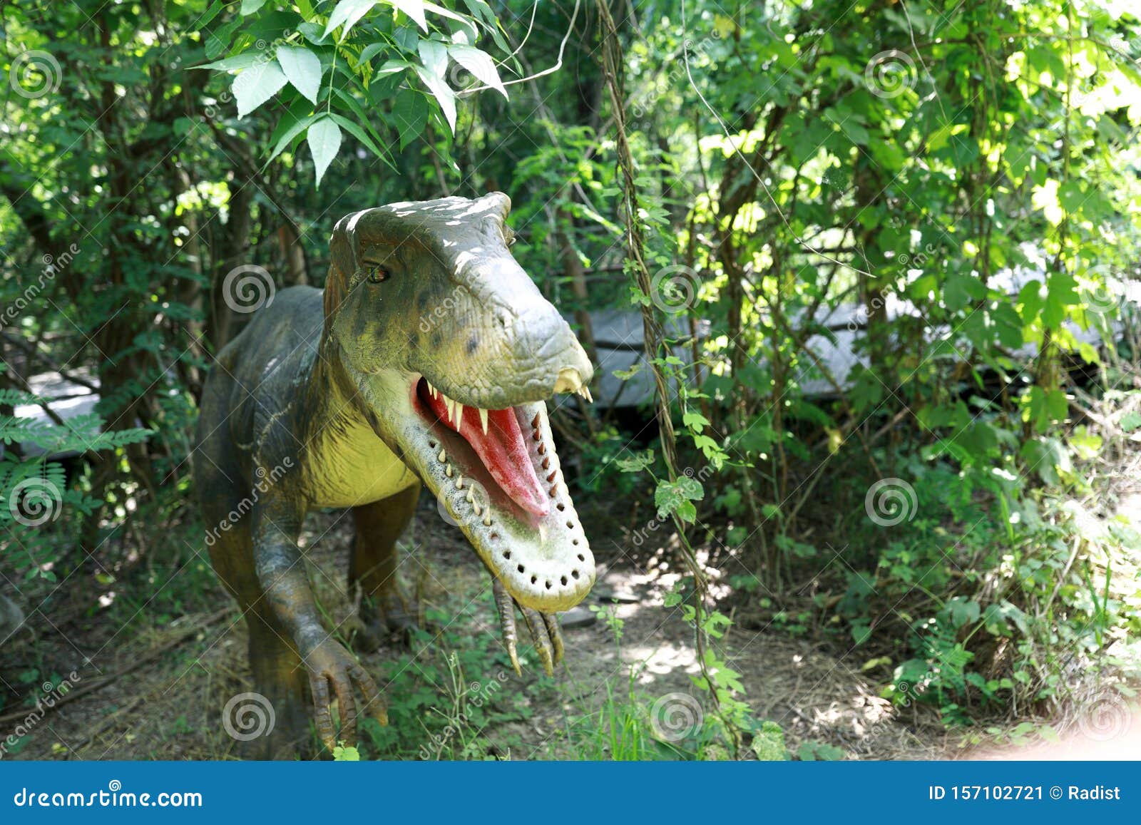 Green dinosaur in park stock image. Image of fear, carnivore - 157102721