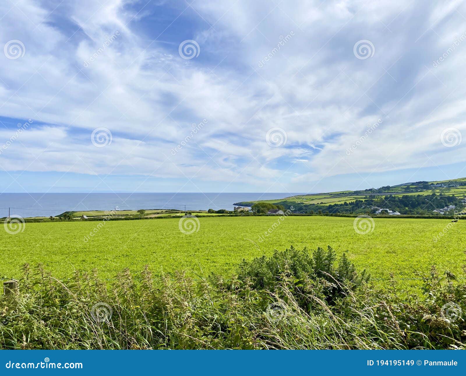Maughold and the Irish Sea Isle of Man Stock Image - Image of meadows ...
