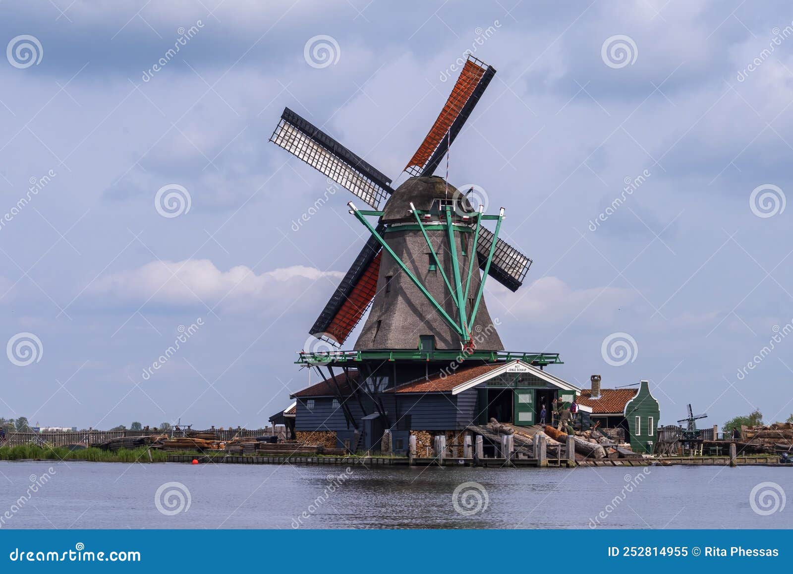 View of a Green Painted Working Mill on a River . Stock Image - Image ...