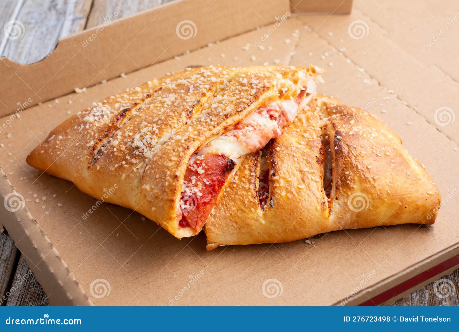 Half Cut Calzone Inside Pizza Delivery Box Stock Photo - Image of fruit ...