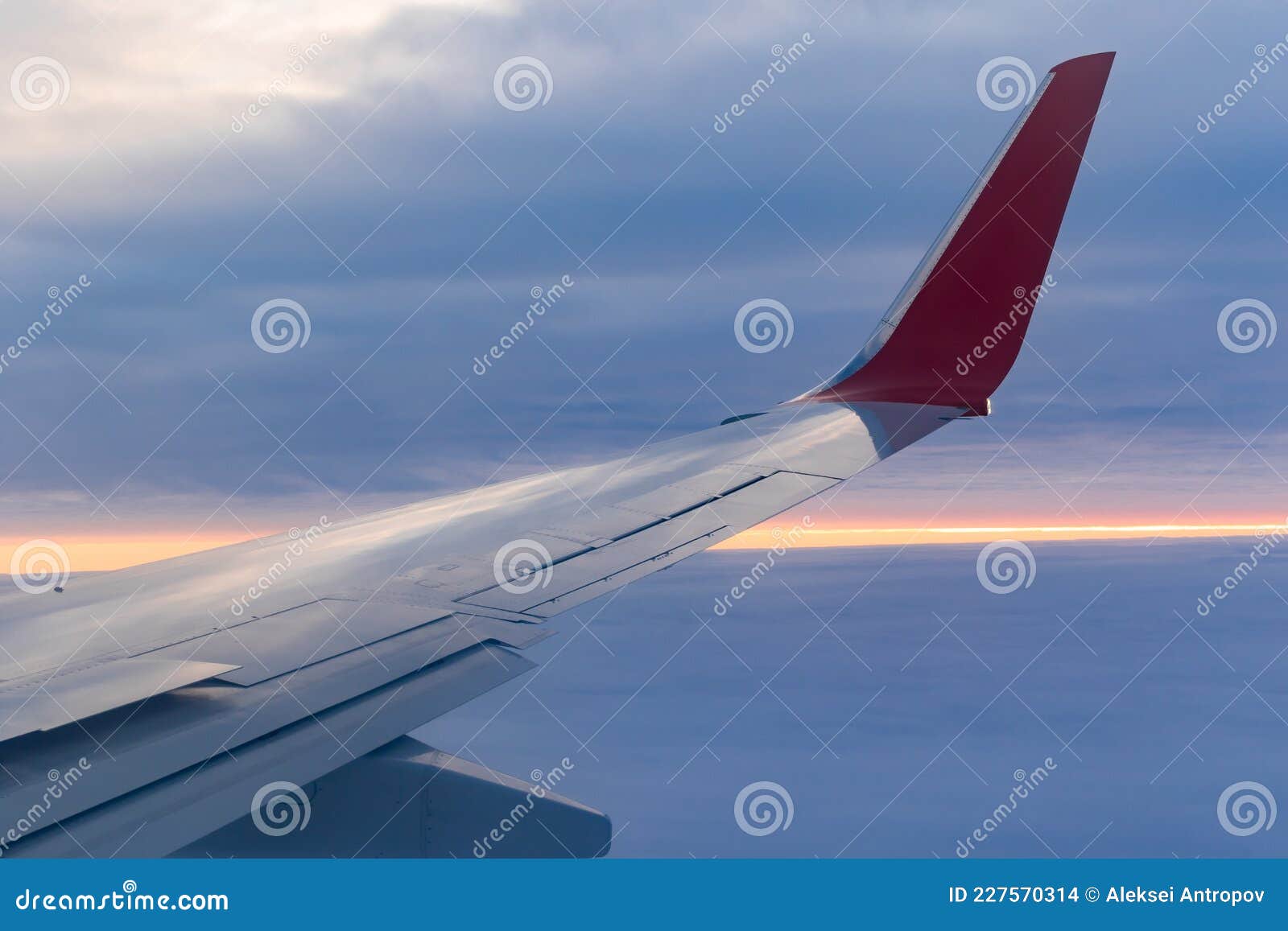 View from a Height Above the Clouds from the Plane`s Window. Part of an ...