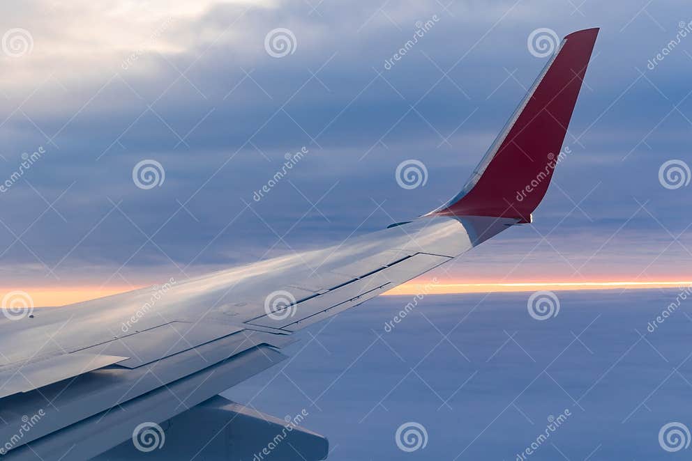 View from a Height Above the Clouds from the Plane`s Window. Part of an ...