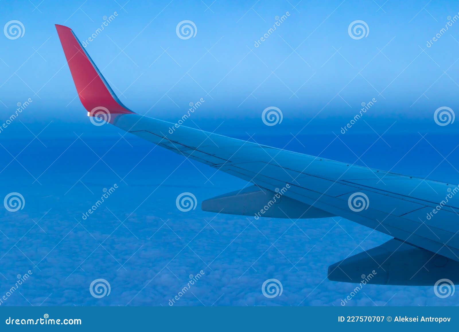 View from a Height Above the Clouds from the Plane`s Window. Part of an ...