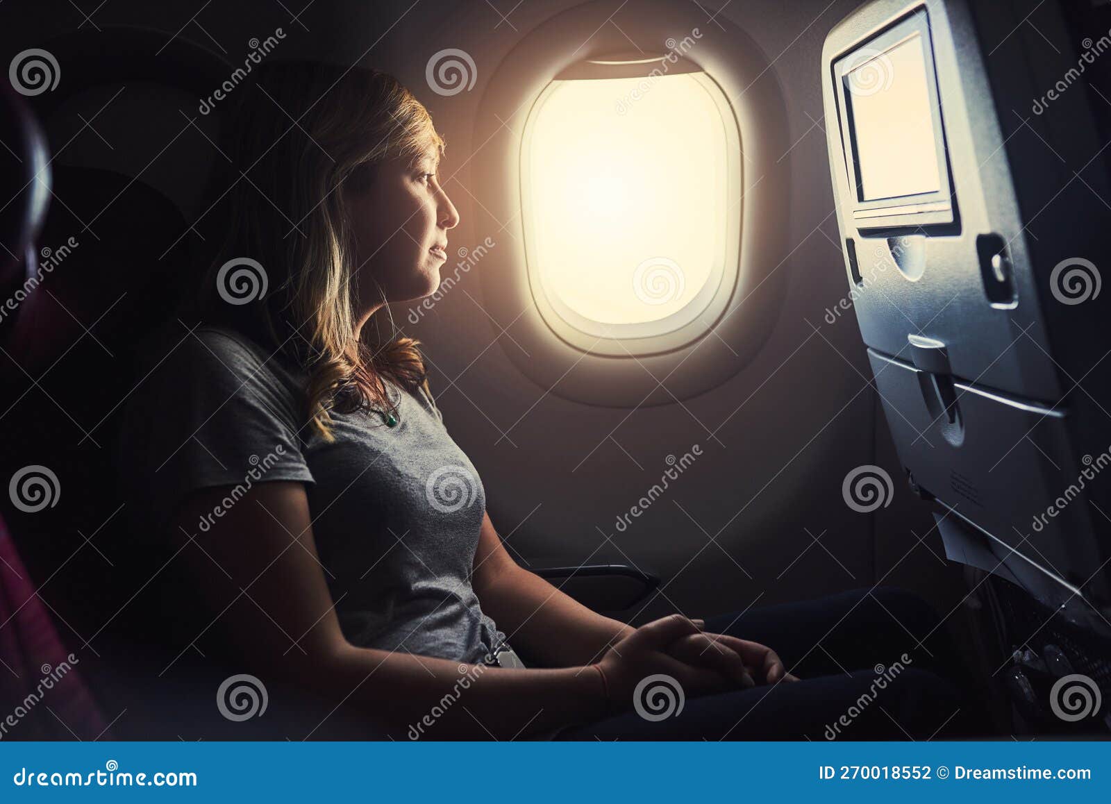 The View from Here is Spectacular. a Young Person in an Airplane. Stock ...