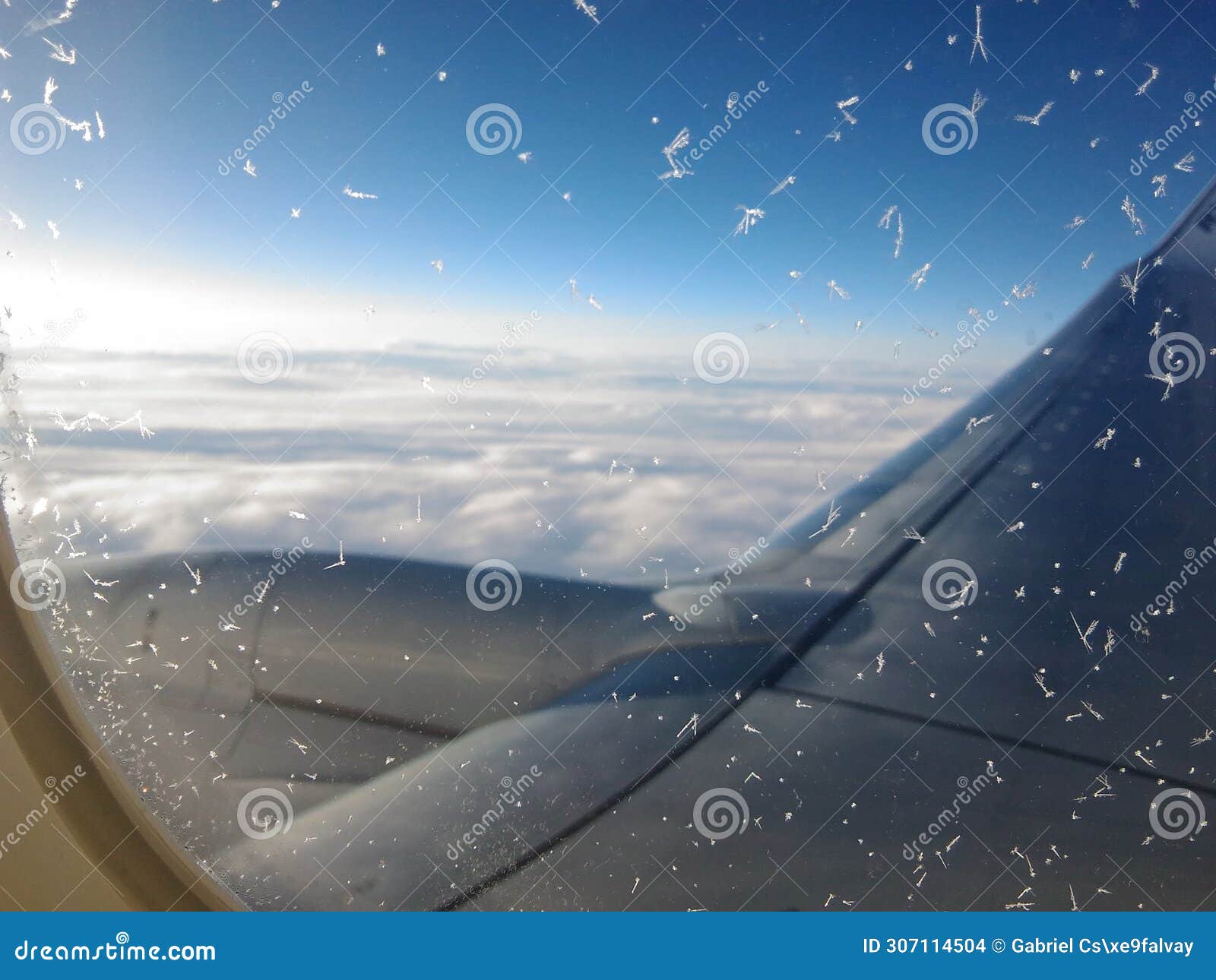 A View from an Icy Airplane Window Stock Photo - Image of flight ...