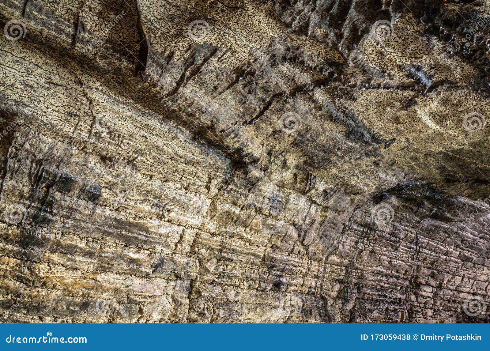 View Inside the Ancient Cave with Stone Walls with Additional Lighting ...