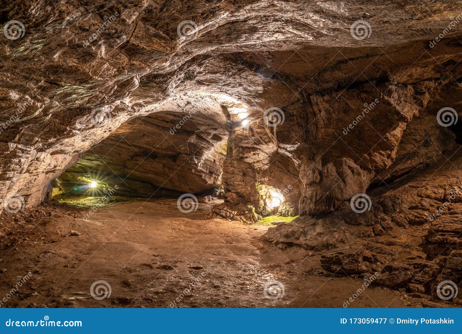 View Inside the Ancient Cave with Stone Walls with Additional Lighting ...