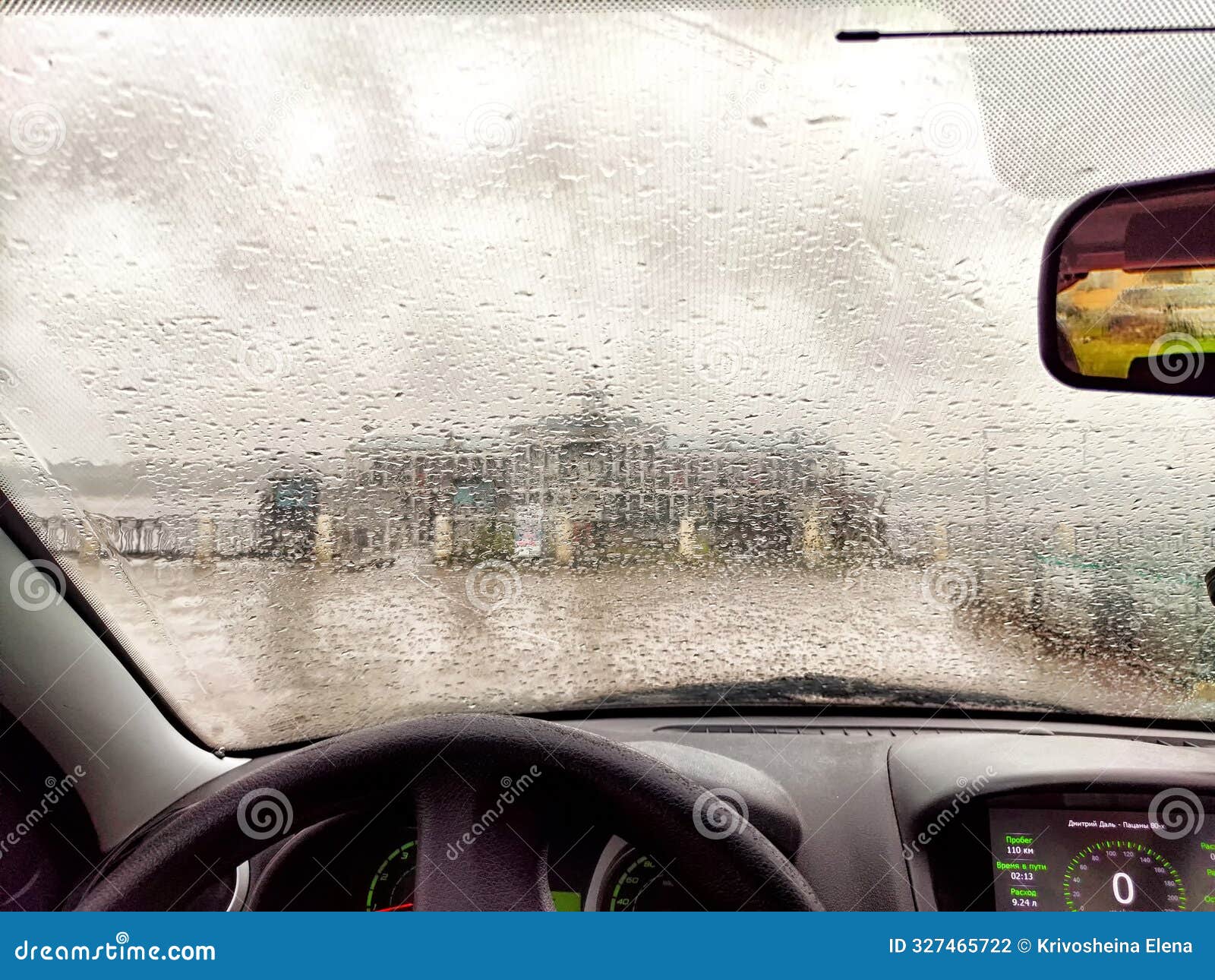 The View from Inside a Car Driving through a Light Rain in the City ...