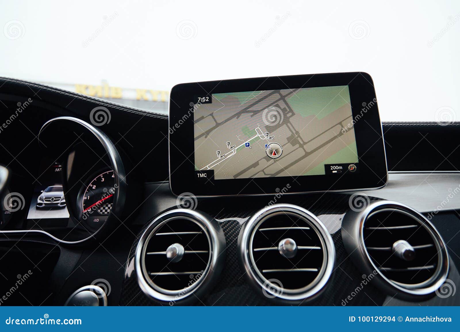 View from Inside a Car on a Part of Dashboard with a Navigation Unit ...