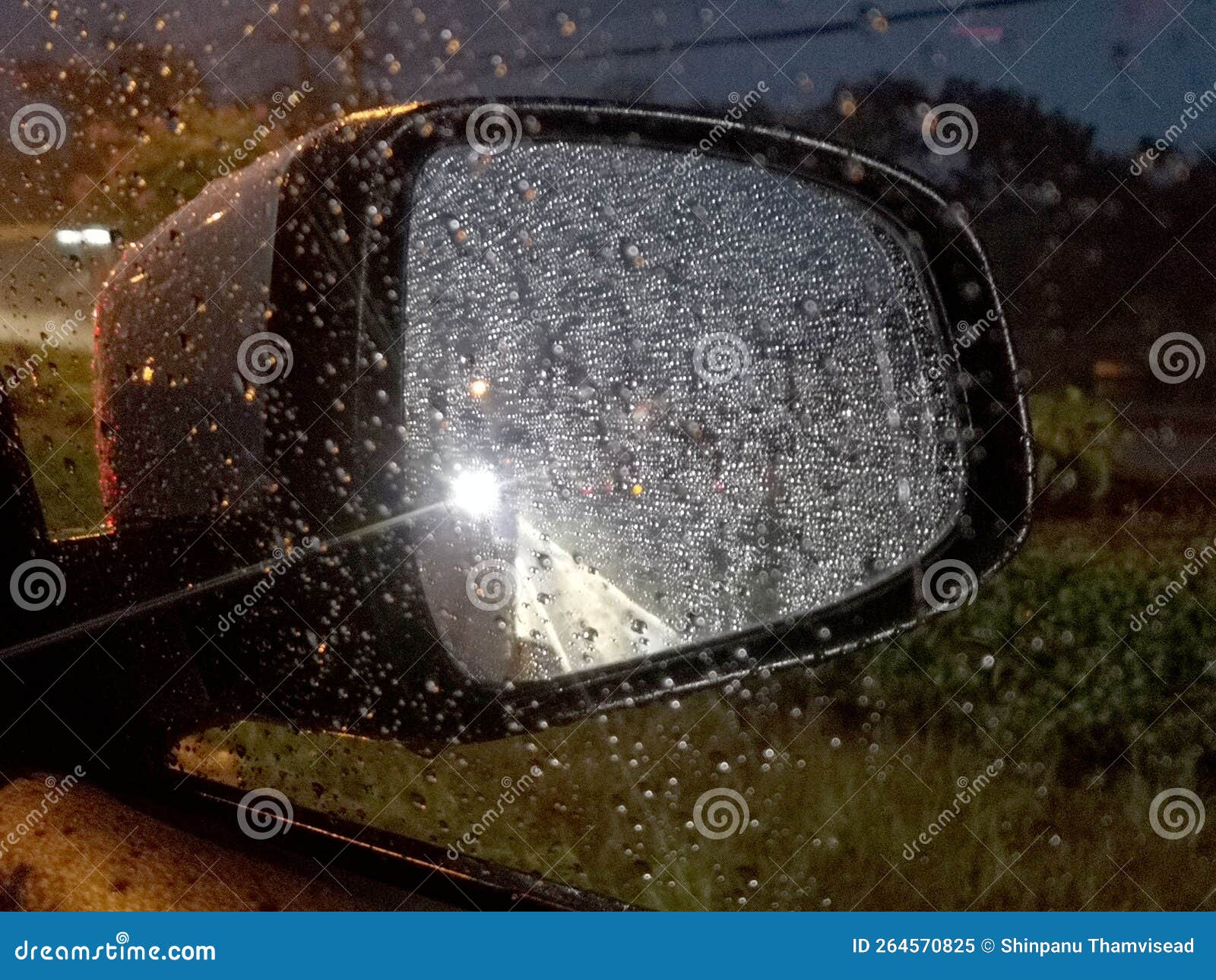 View from Inside Car through Window To See Wing Mirror while of Blur ...