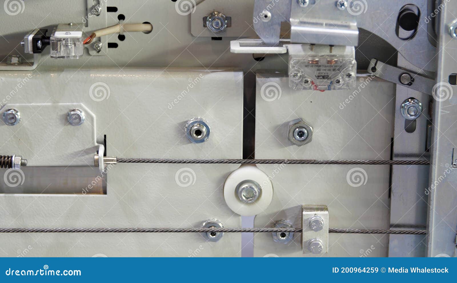 View Inside of Elevator Mechanism with Moving Stretched Metal Cable ...