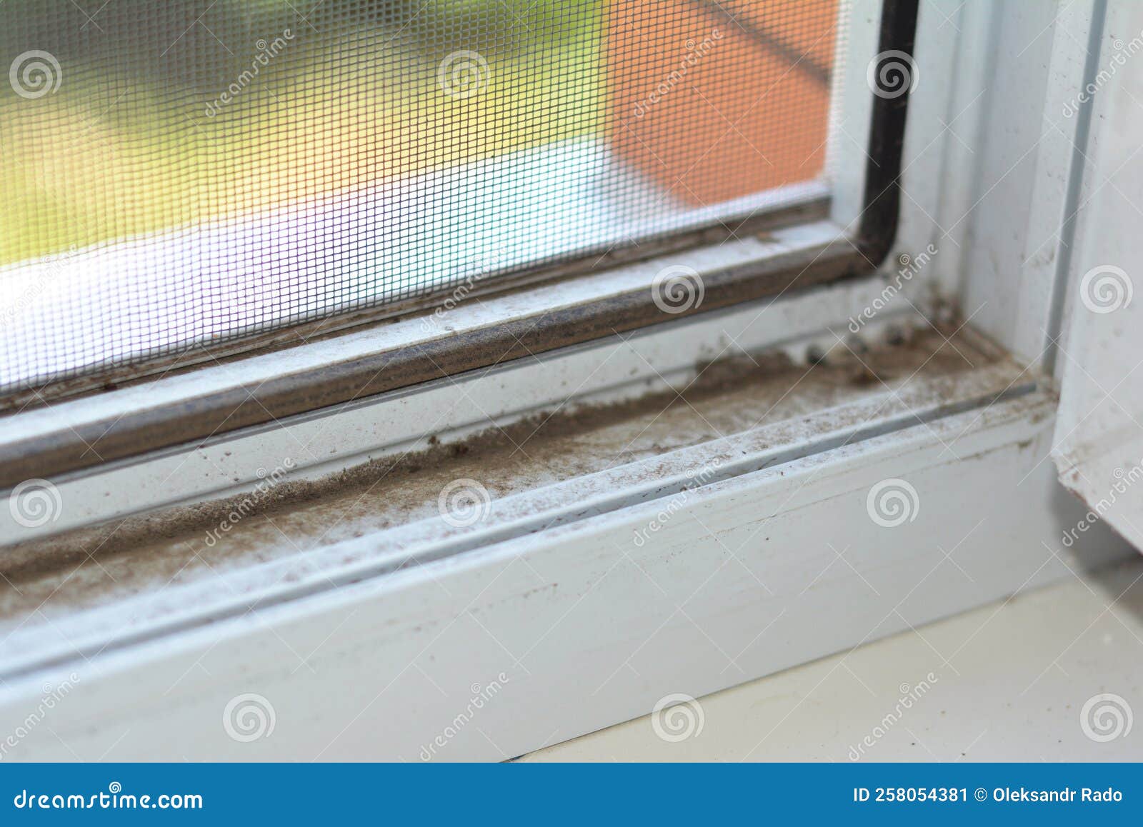 A View from Inside the House of a Dusty Window. a Dirty UPVC Window ...