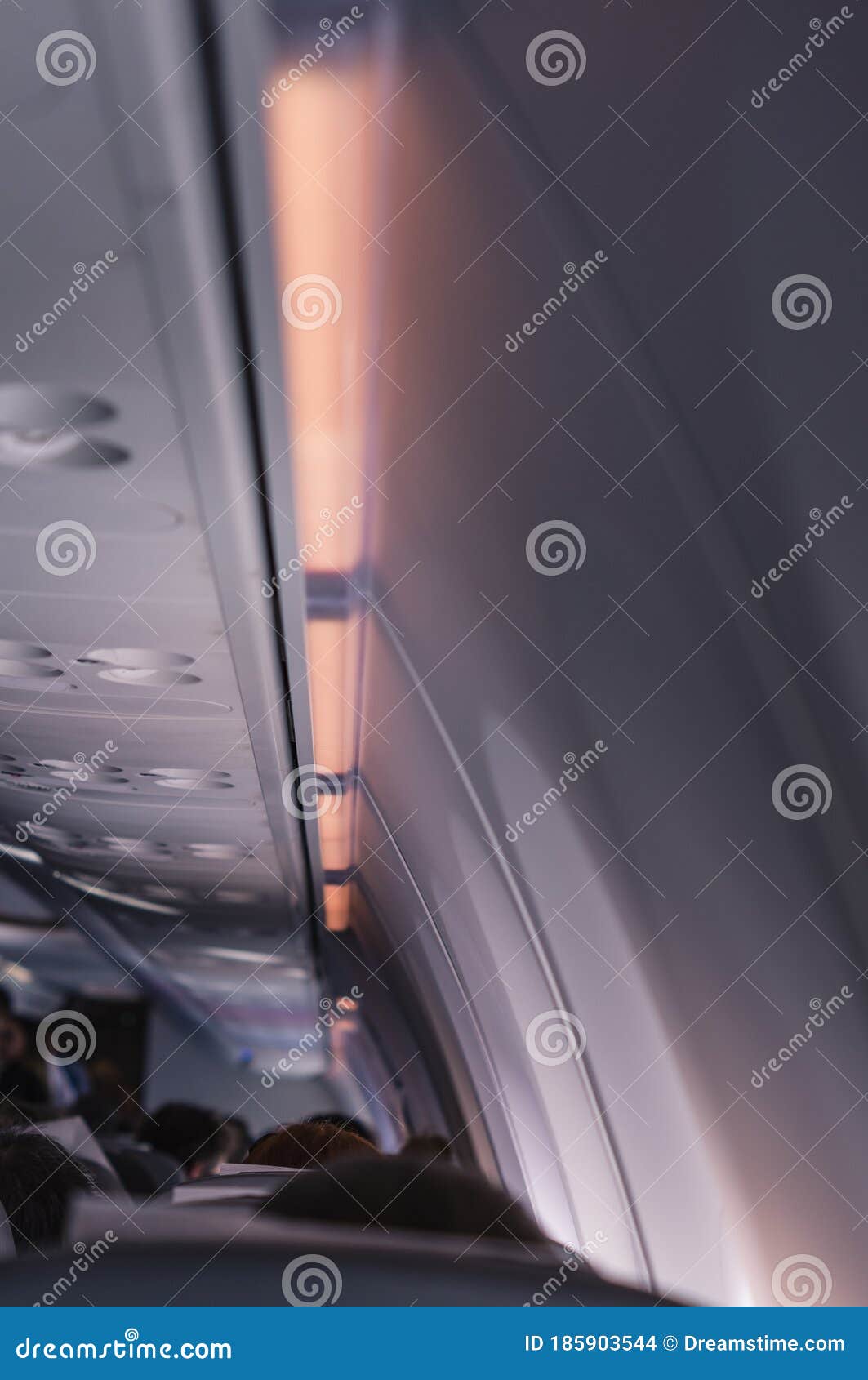 View Inside a Passenger Plane in Flight Stock Photo - Image of crowded ...