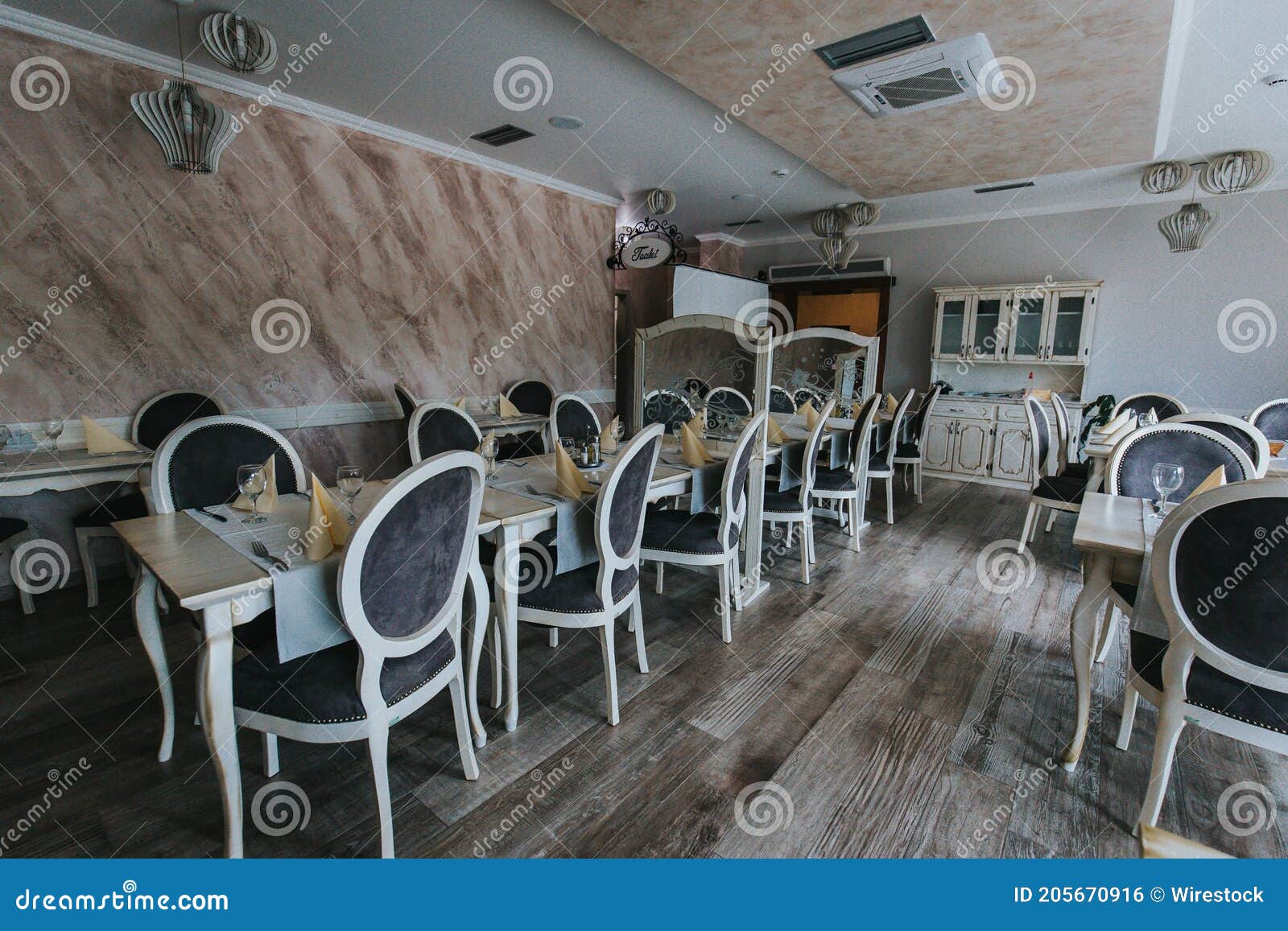 View Inside a Restaurant with Arranged Tables and Chairs Stock Photo ...