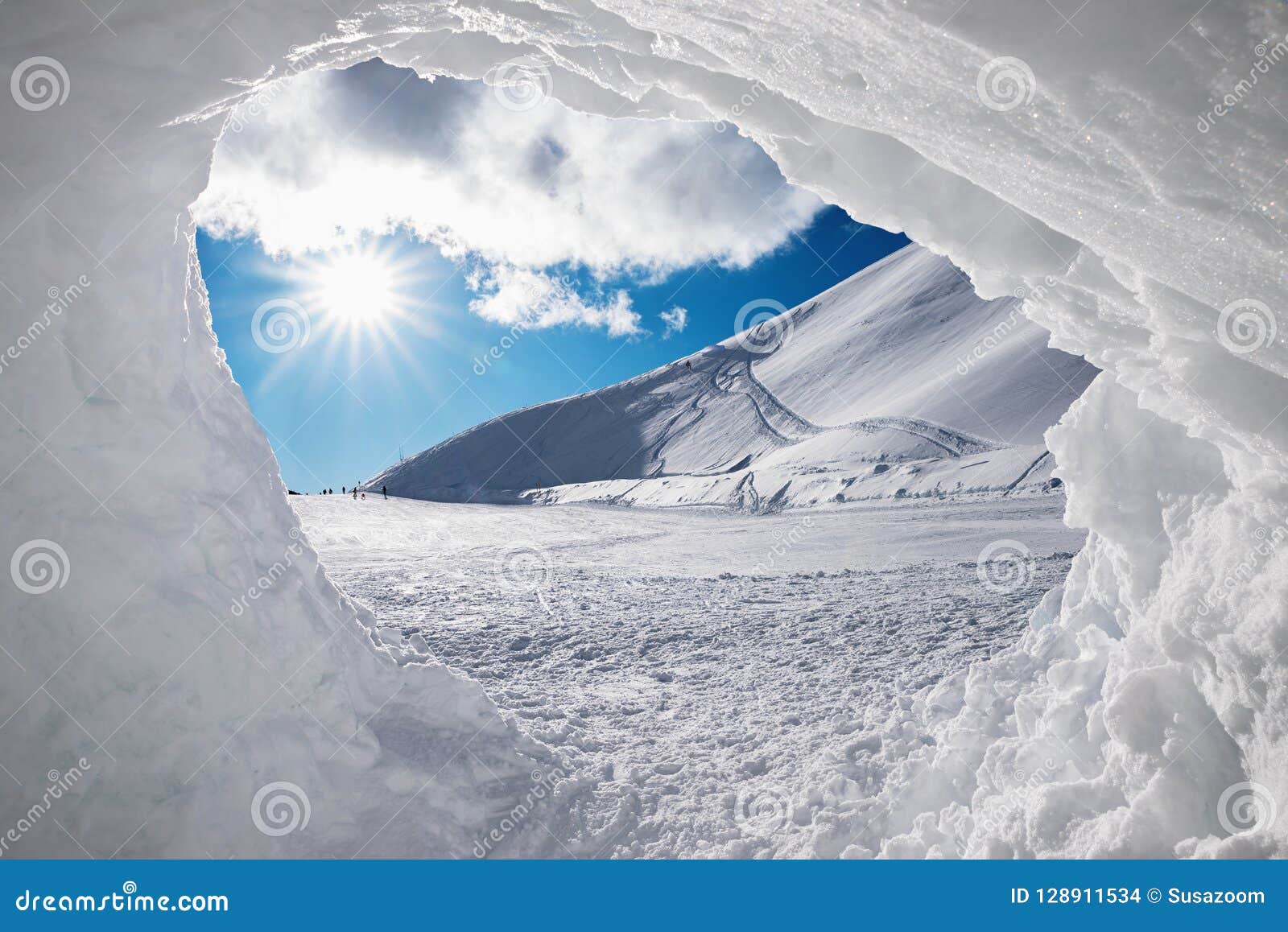View through Snow Grotto into Winter Landscape Stock Photo - Image of ...