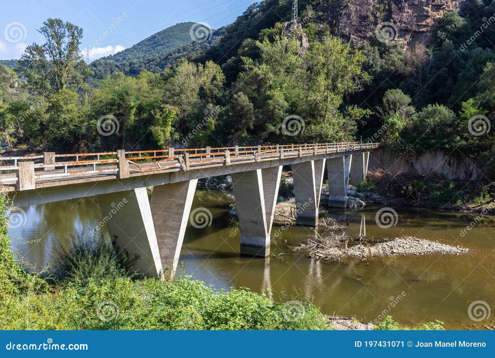 View of a Dilapidated Bridge with a River Below Stock Image - Image of ...