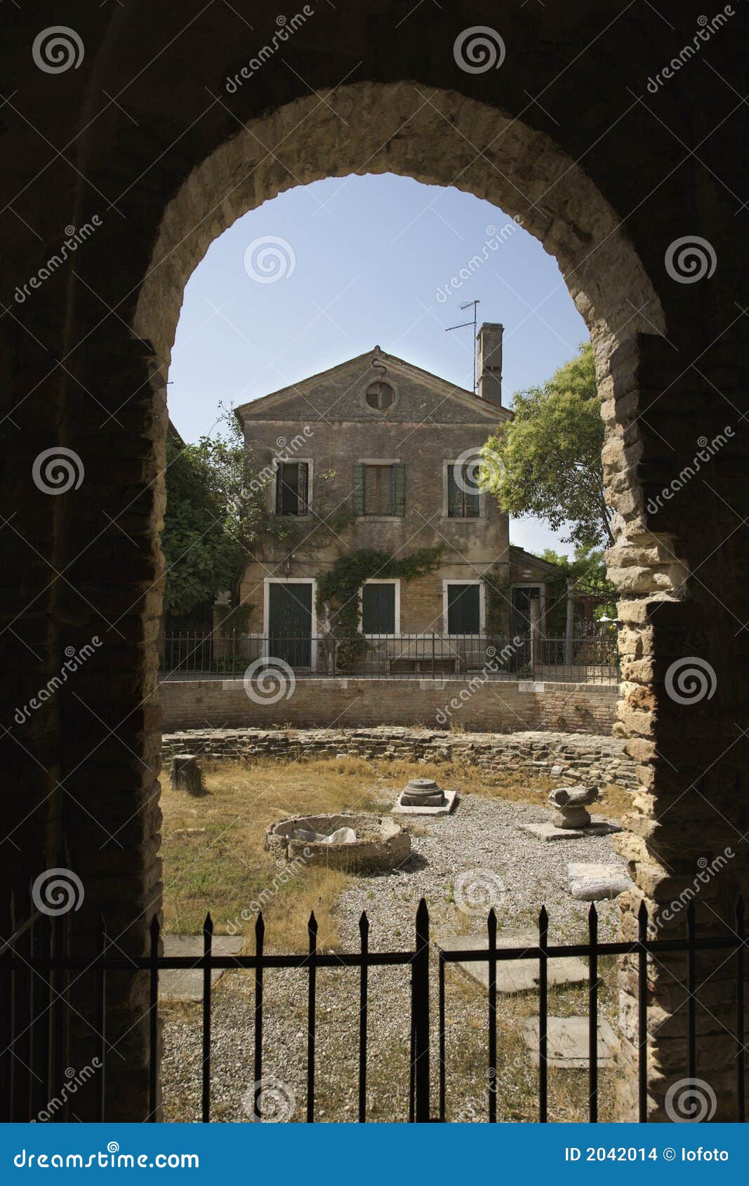 View of Italian Dwelling through Archway. Stock Photo - Image of ...