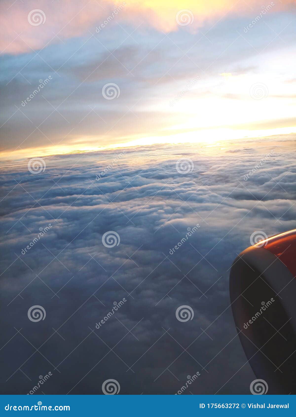 View of Jet Engine and Clouds or Sunset from Inside the Plane. Stock ...