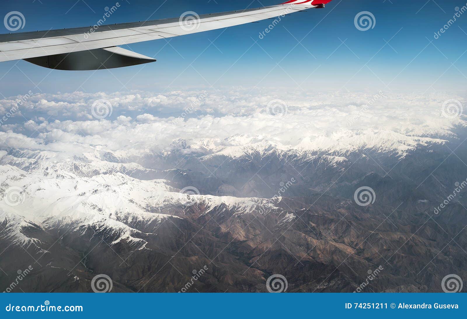 View of jet plane wing stock image. Image of cloud, blue - 74251211