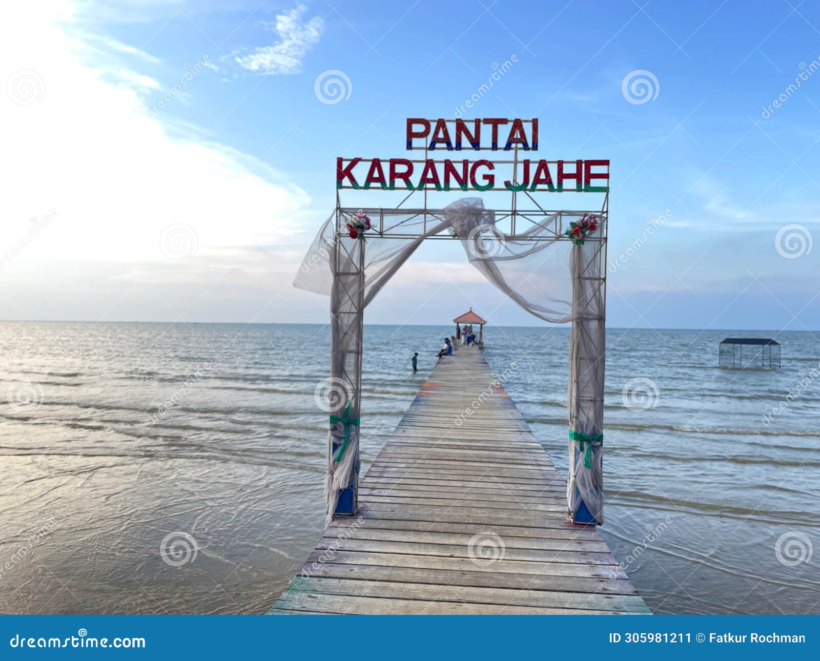 View of Karang Ginger Beach, Central Java with a Wooden Bridge and Hut ...