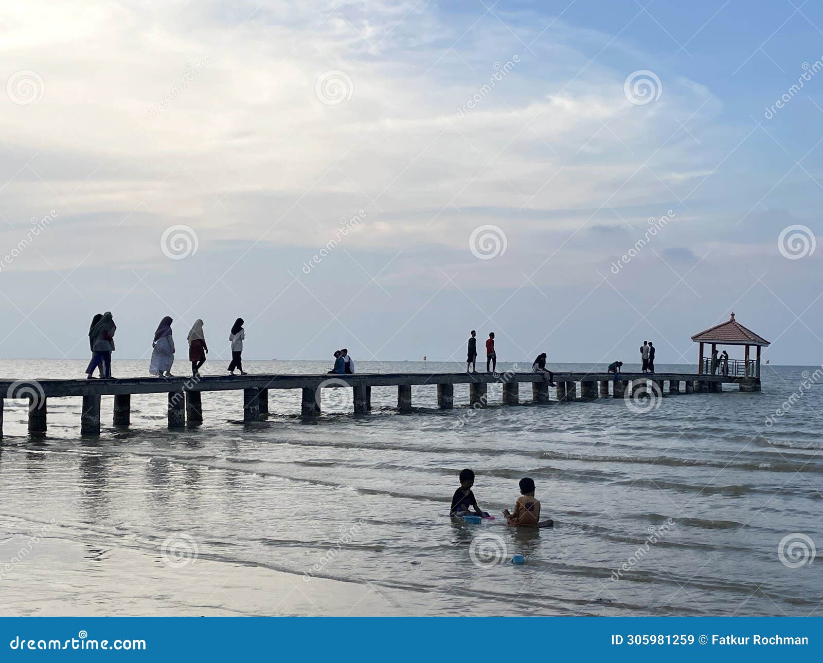 View of Karang Ginger Beach, Central Java with a Wooden Bridge and Hut ...