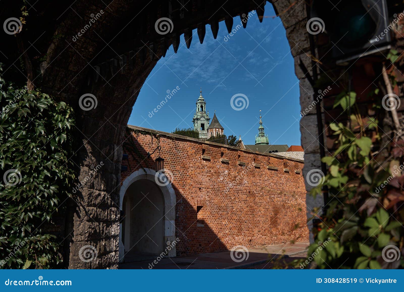 View of Krakow Castle through the Arch of the Gate Stock Image - Image ...