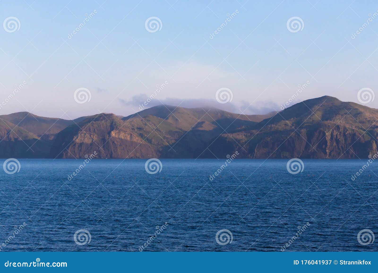 View on a Kunashir Island with Volcano Tyatya from the Sea. Stock Image ...