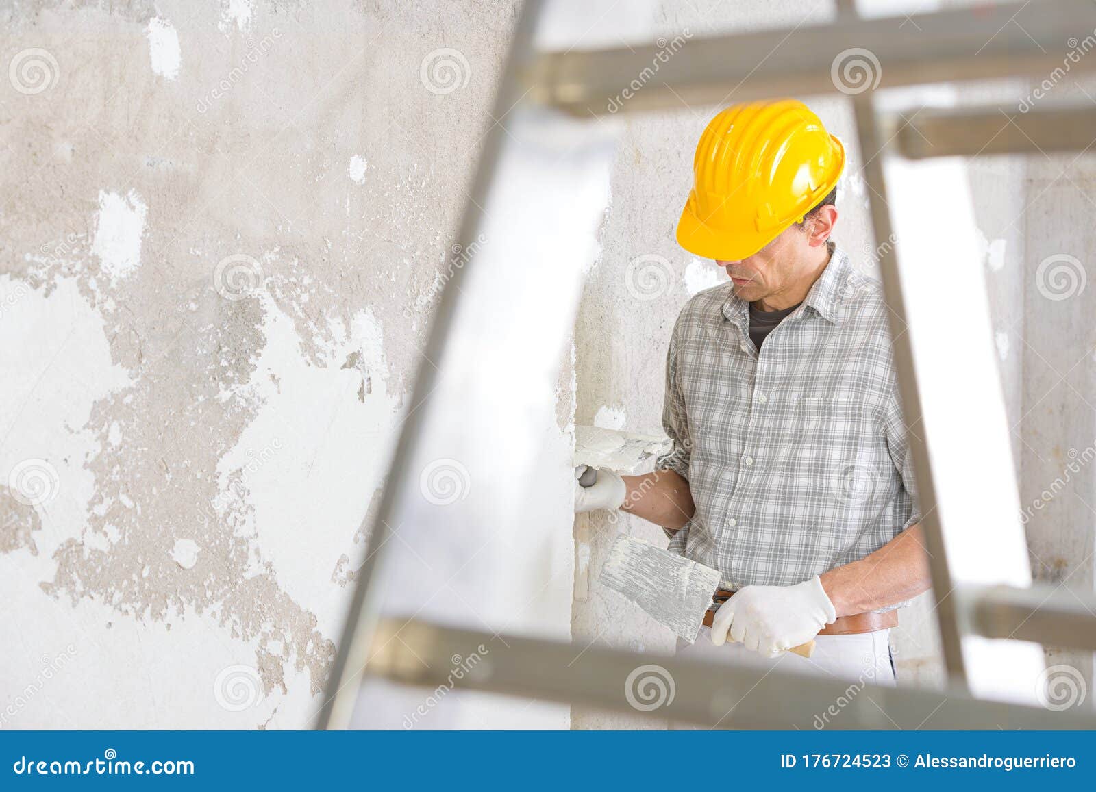 View through a Ladder of a Builder at Work Stock Image - Image of ...