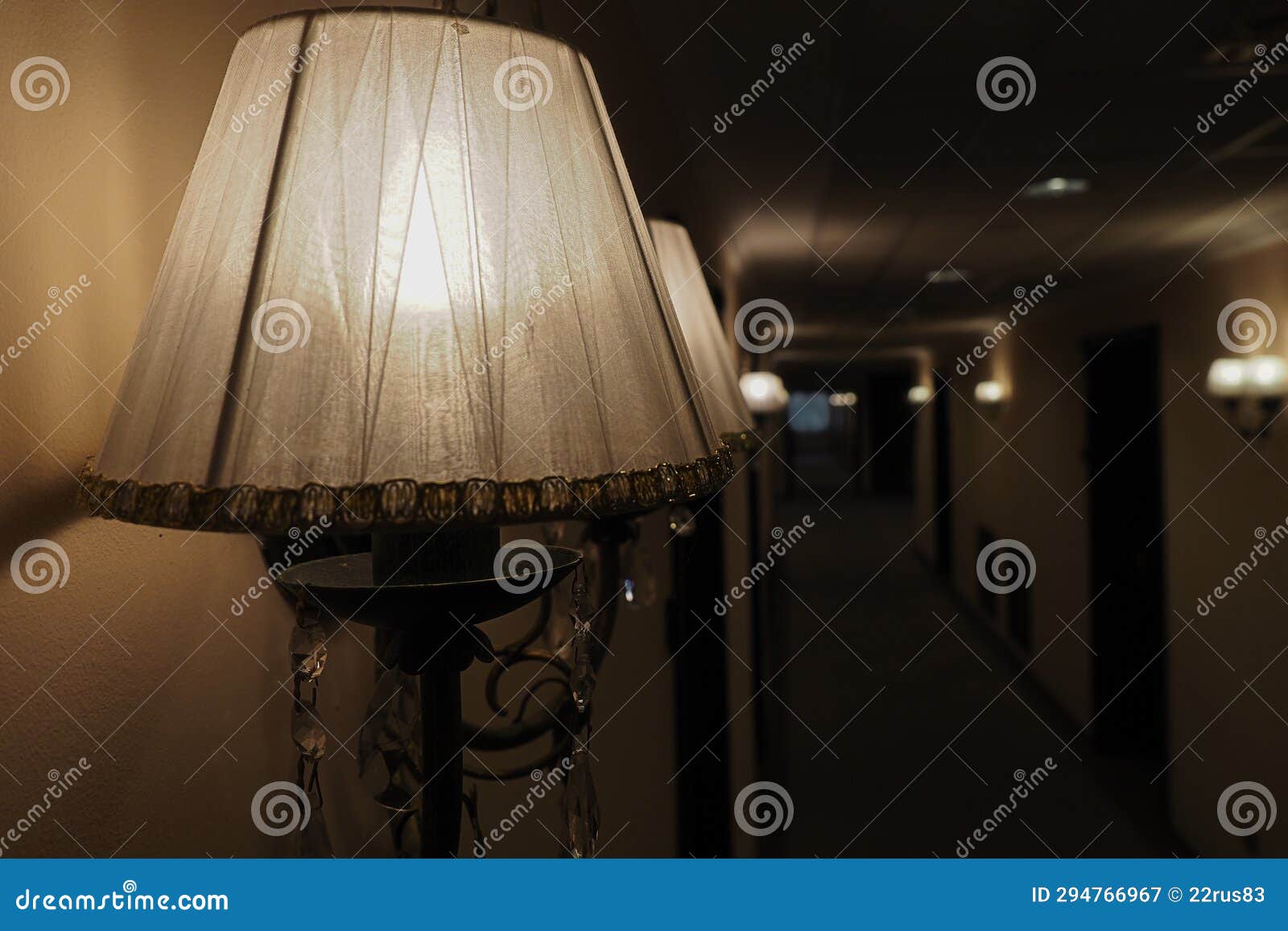 View of Lamp on Wall in Hotel Hallway. Dim Light in Dark Hotel Corridor ...