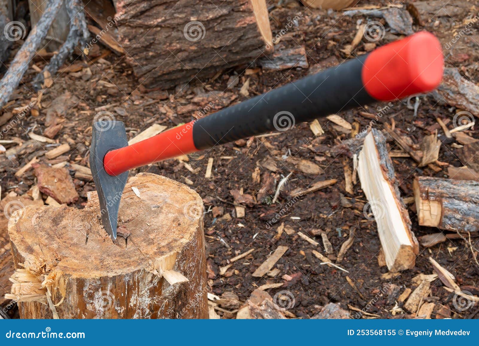 An Ax Cleaver Stuck In A Log On The Background Royalty-Free Stock Photo ...