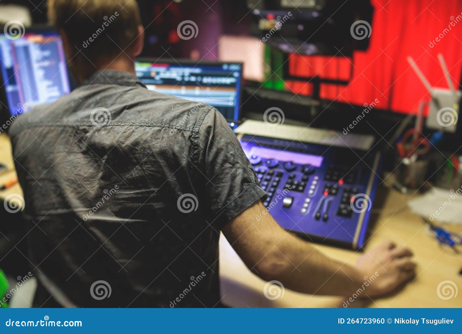 View of Lighting Technician Operator Working on Mixing Console ...