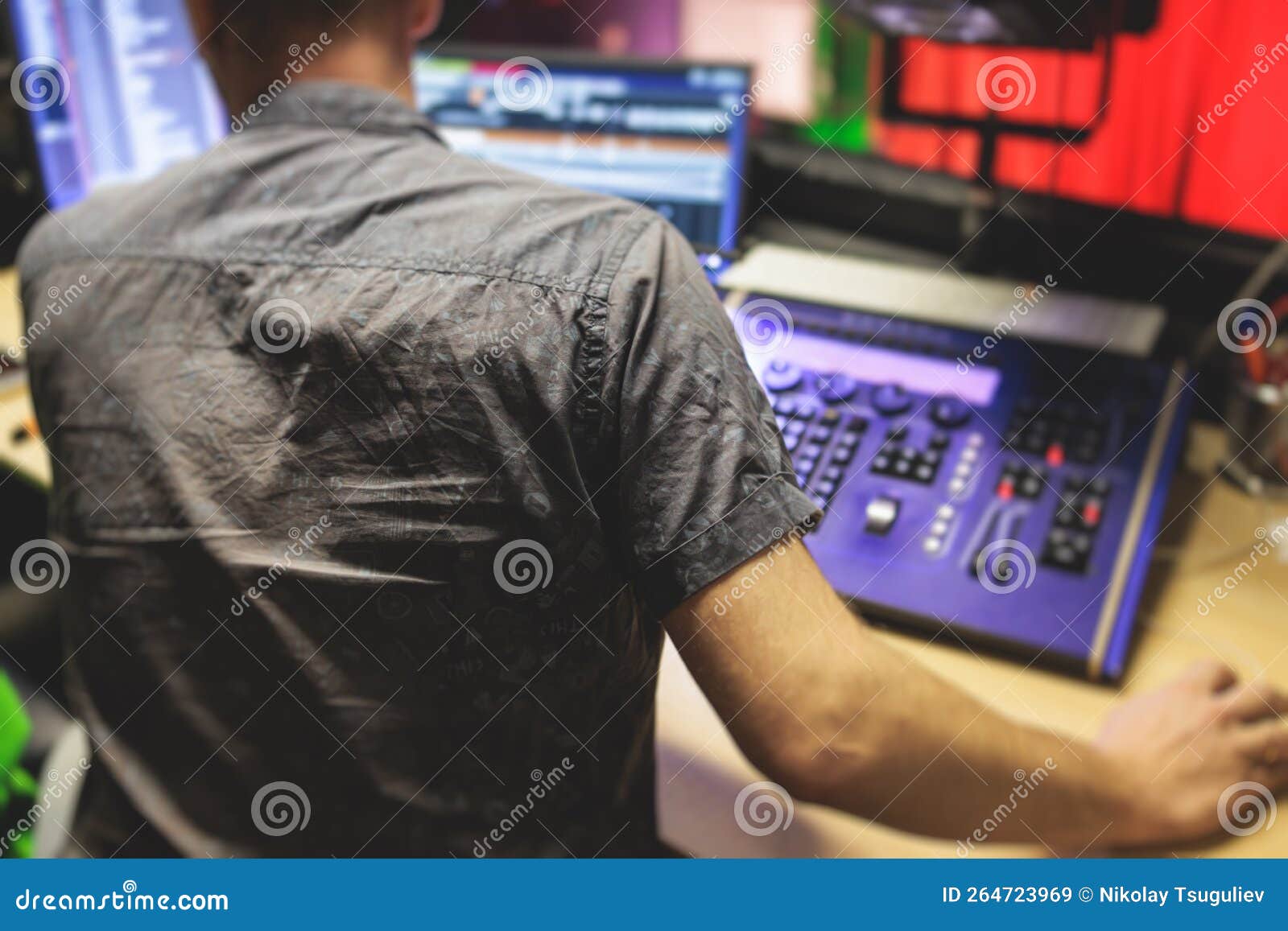 View of Lighting Technician Operator Working on Mixing Console ...