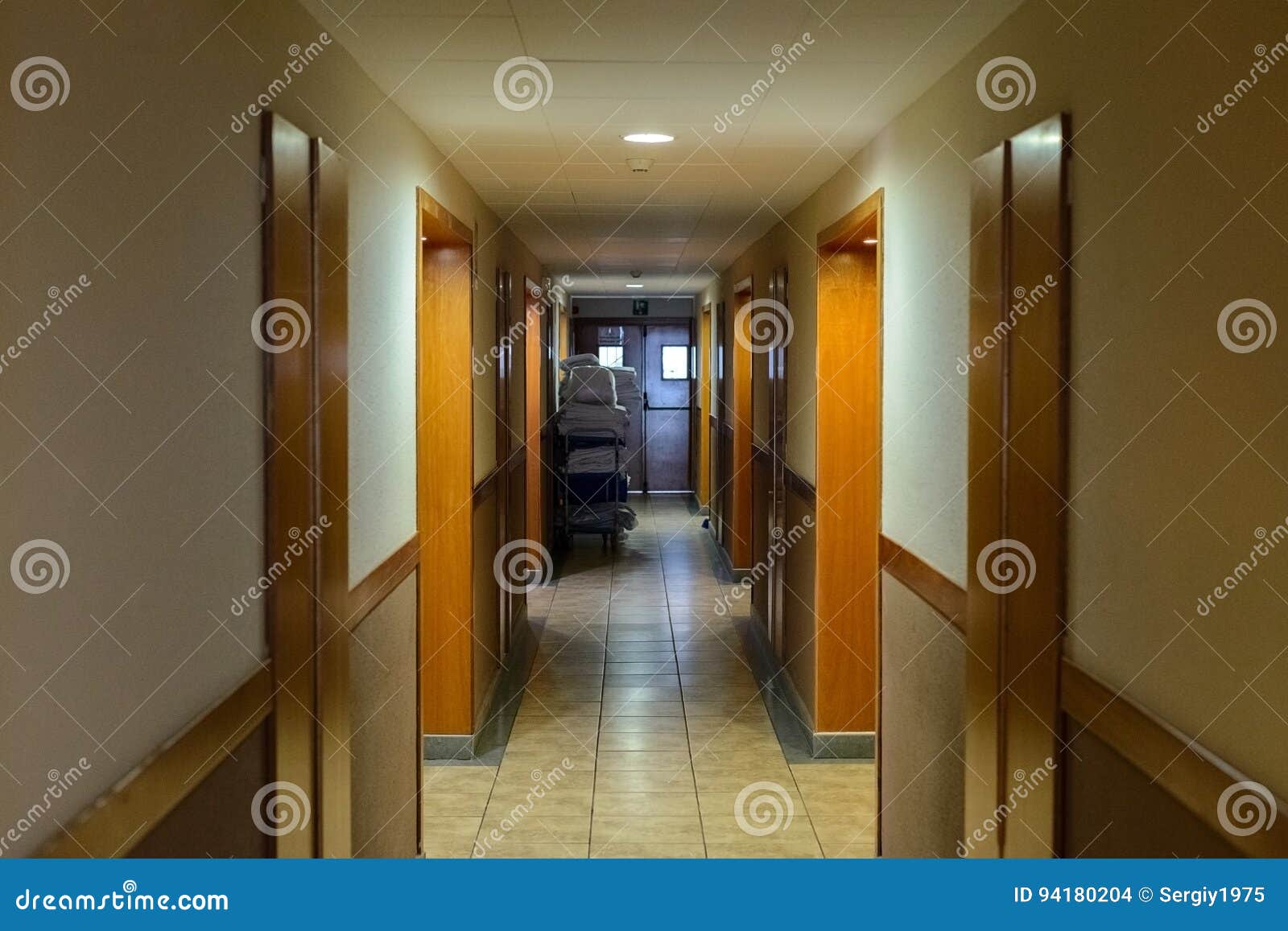 View of the Long Corridor in a Hotel Stock Photo - Image of design ...