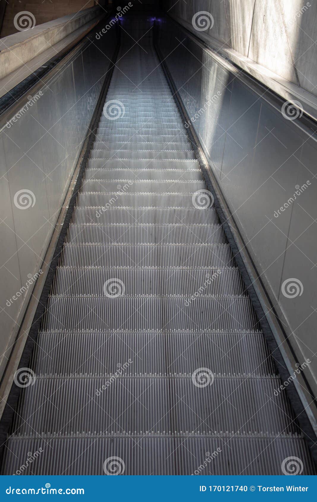 A View of Long Escalators with Stainless Steel Cladding and Exposed ...